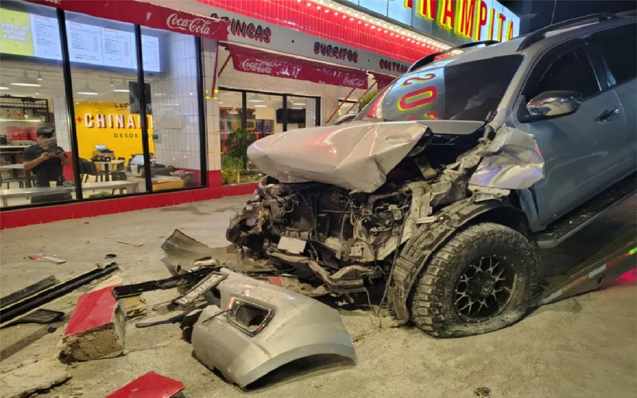 Front end of pickup destroyed crashing through Cancun taco restaurant ...