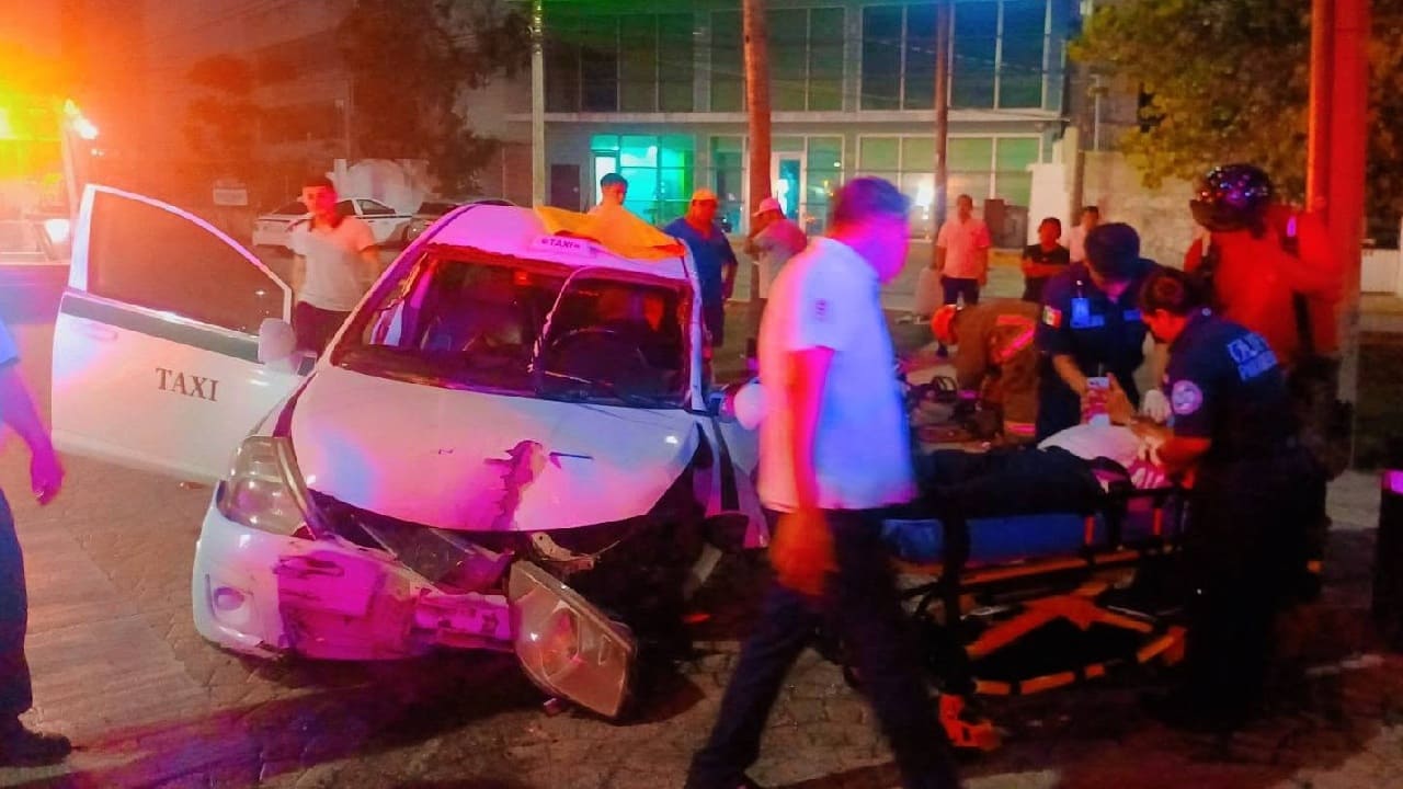 Urban rescue personnel free taxi driver trapped by concrete bollards in ...