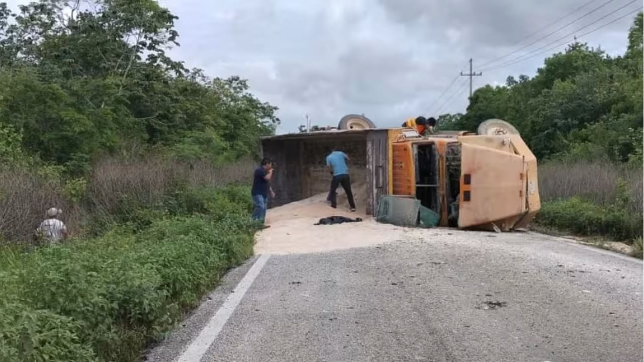Driver topples truck and spills load shutting road nearly 3 hours ...